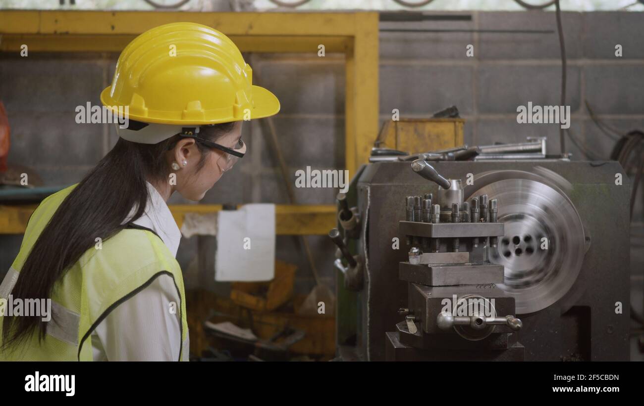 Asian professional mechanical engineer or operation woman wearing ...