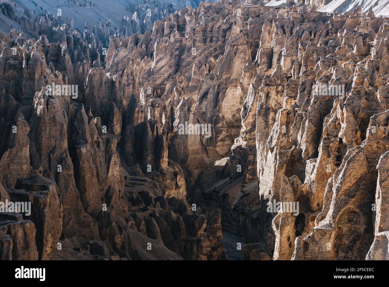 Eroded landscape and rock towers in Tibet Stock Photo - Alamy