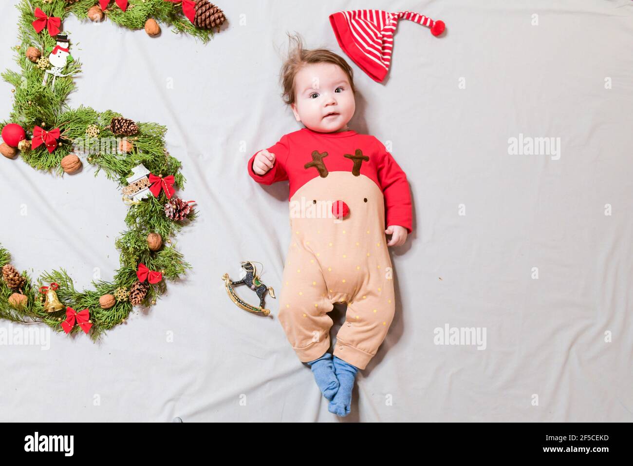 the child is five months old. 5 months old cute baby portrait. 5 digit ...