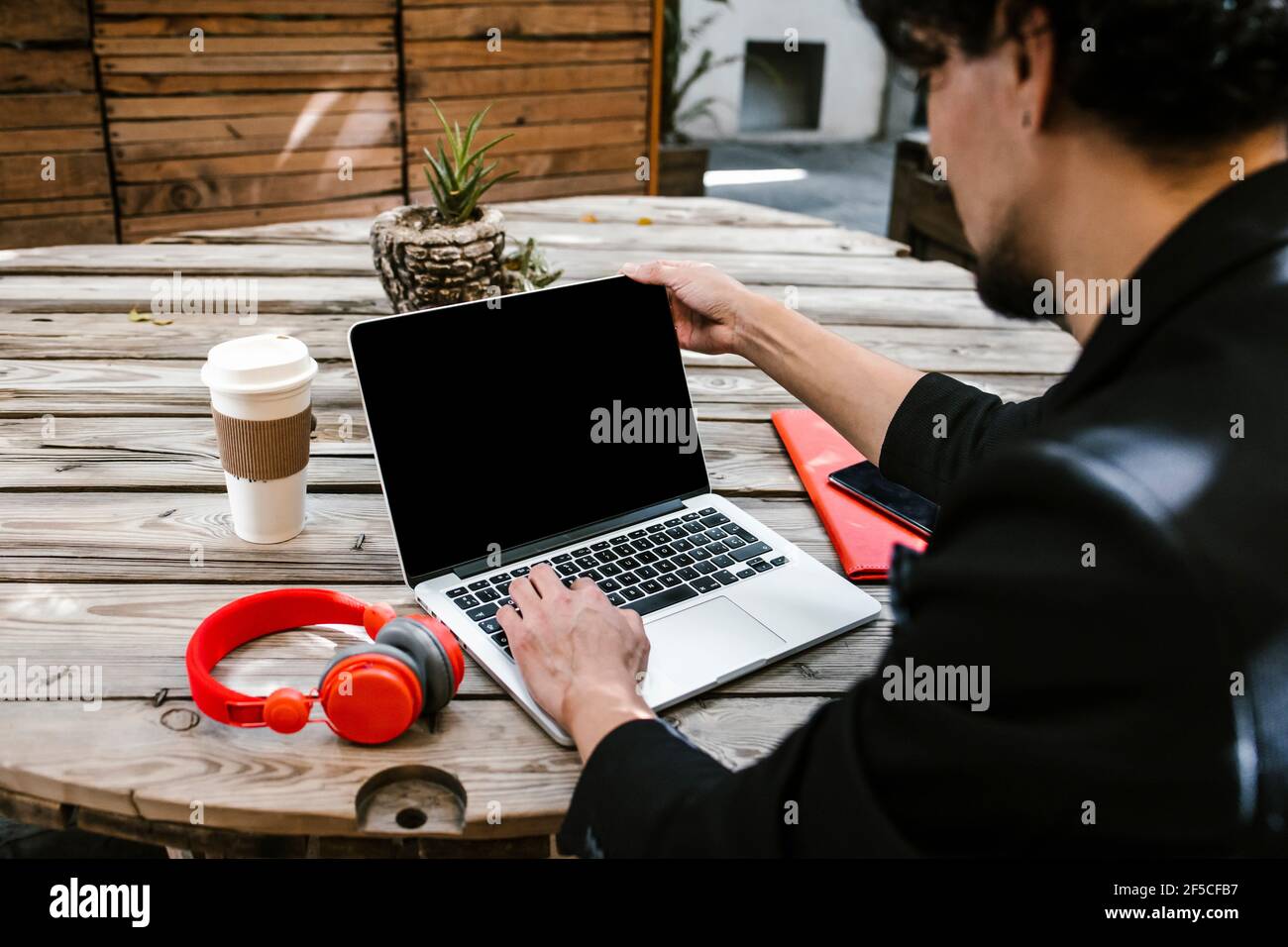 latin man working with computer at office in Mexico city Stock Photo ...