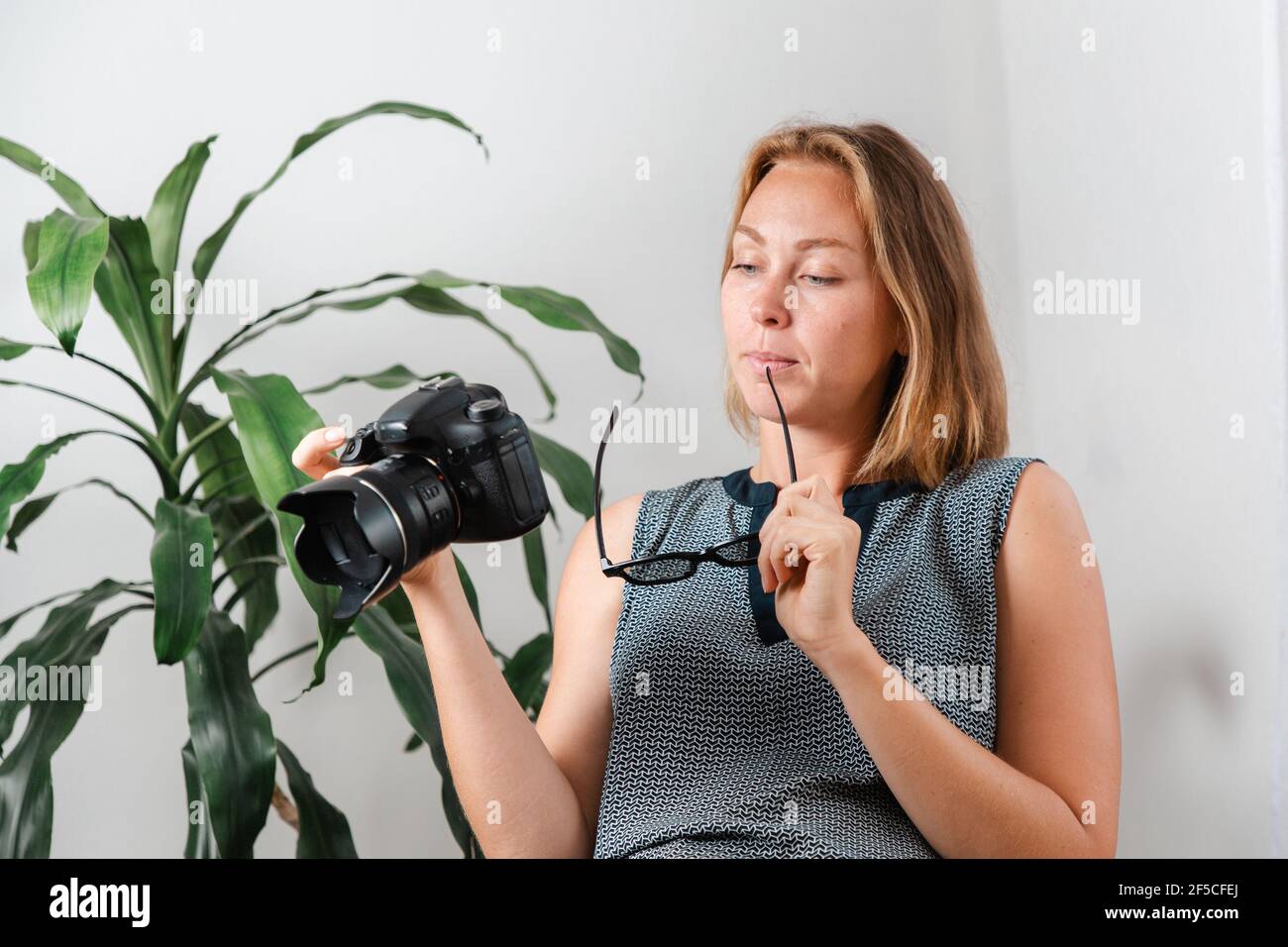 Woman retoucher looking camera hi-res stock photography and images - Alamy