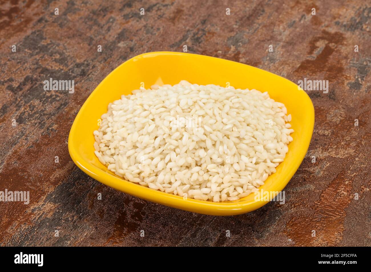 Raw Arborio rice for Italian risotto Stock Photo - Alamy