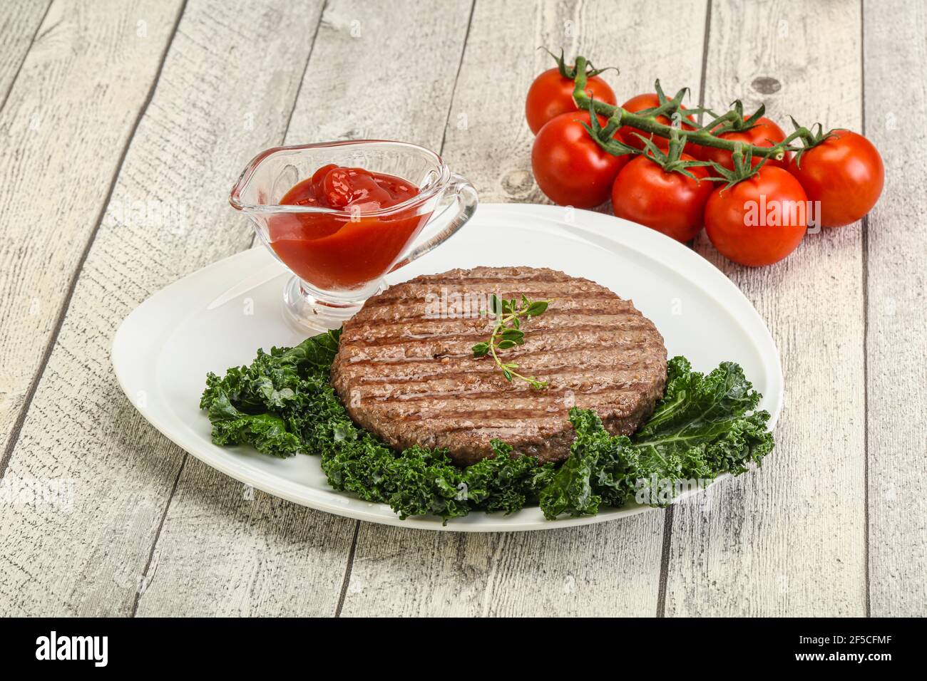 Grilled tasty beef cutlet for burger Stock Photo - Alamy