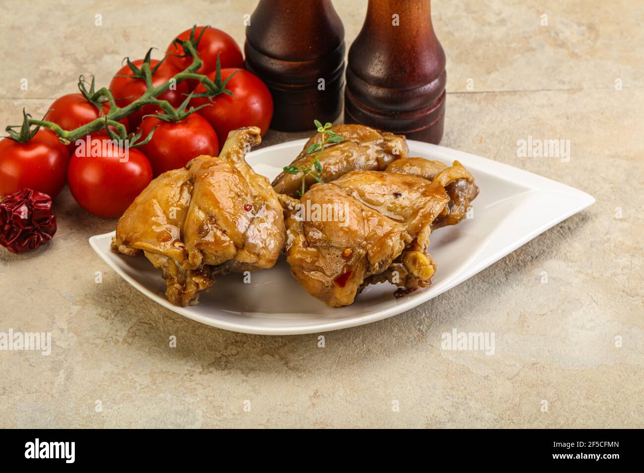 Rabbit stew in sweet and spicy sauce Stock Photo - Alamy