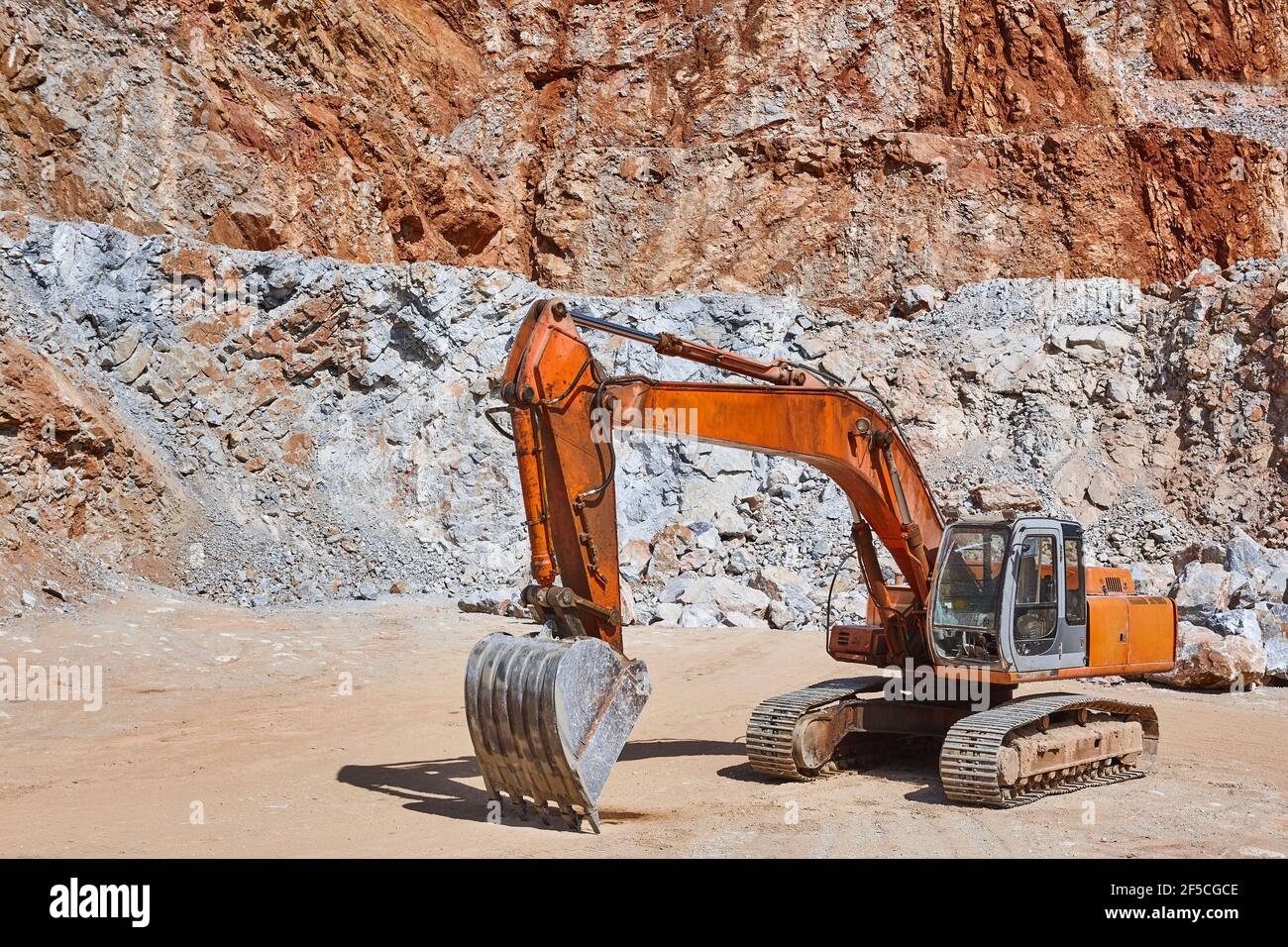 Heavy excavator on a quarry. Excavation machinery. Earthmover Stock ...