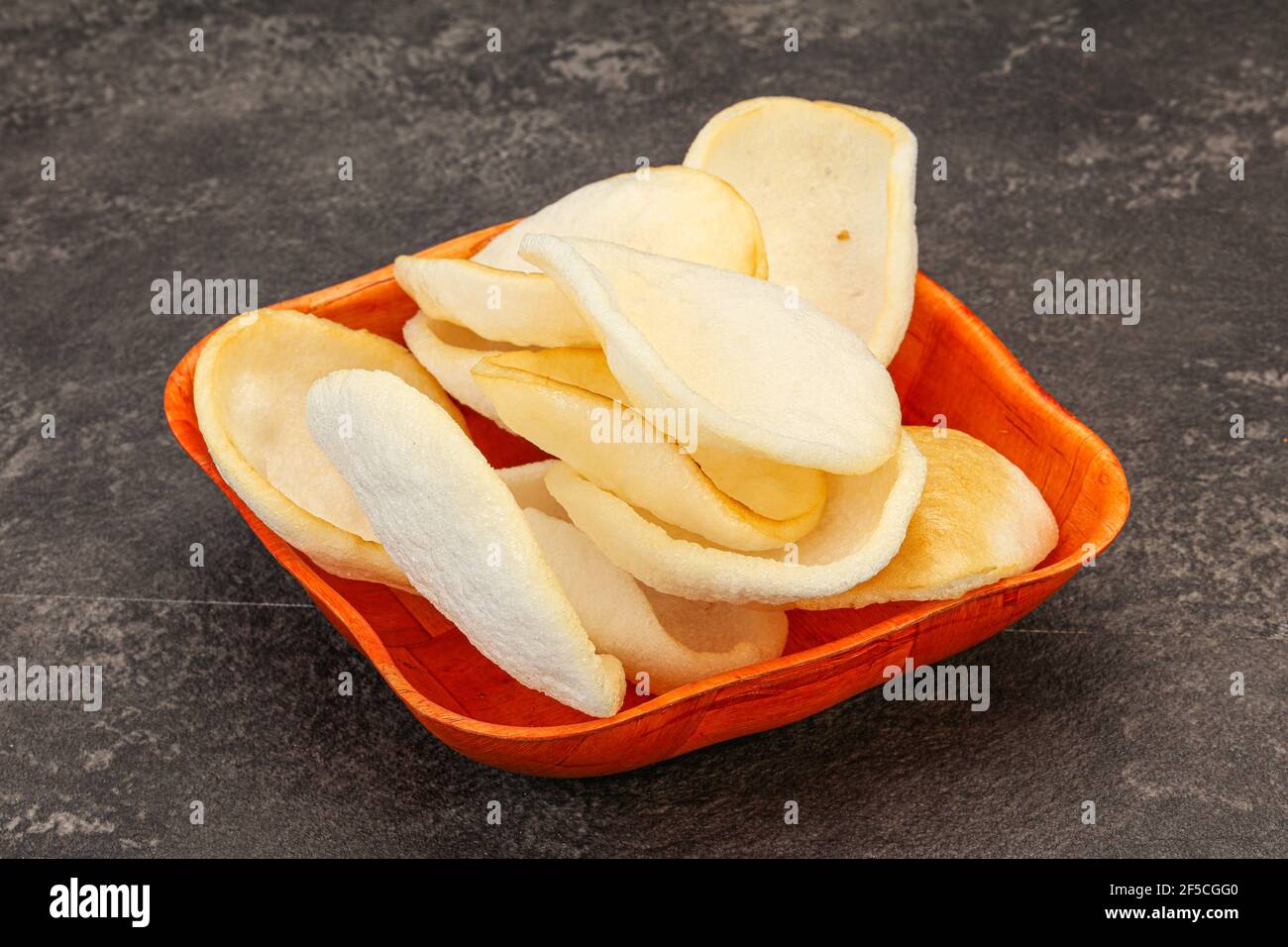 Asian cusine - homemade prawn chips in the bowl Stock Photo - Alamy