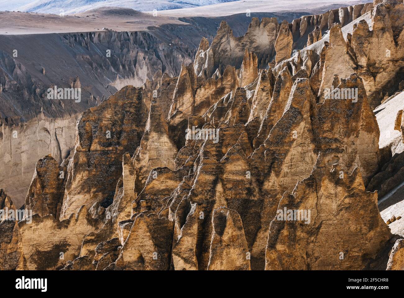 Eroded landscape and rock towers in Tibet Stock Photo - Alamy