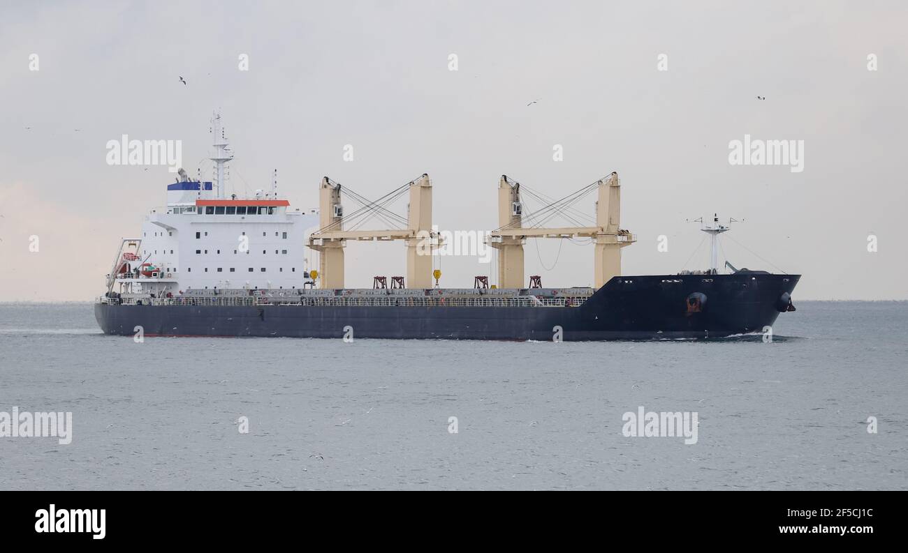 A cargo ship carrying goods between ports Stock Photo - Alamy