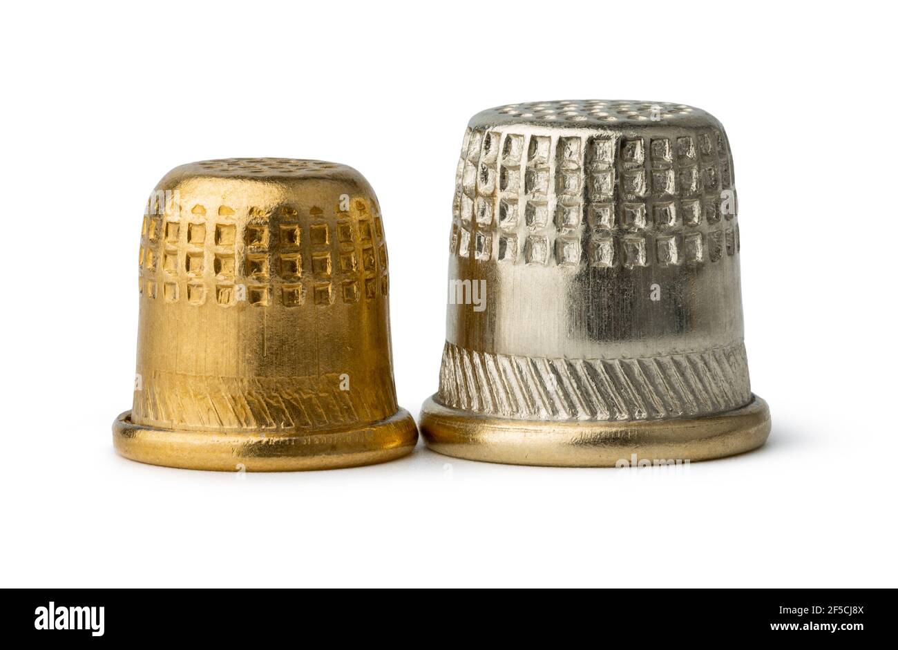 Metal sewing thimble isolated on white Stock Photo - Alamy