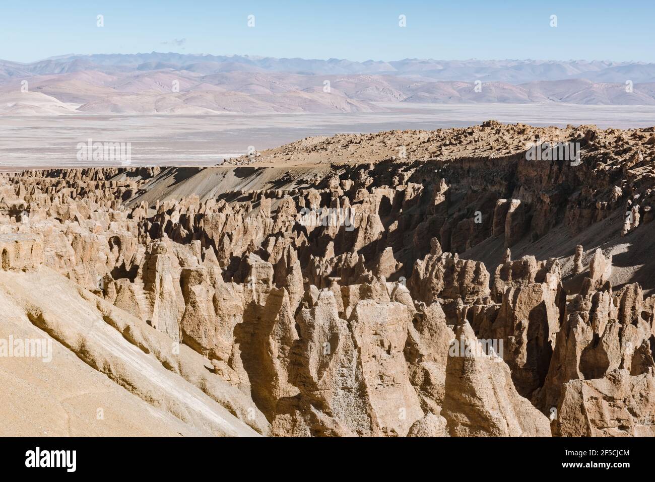Eroded landscape and rock towers in Tibet Stock Photo - Alamy