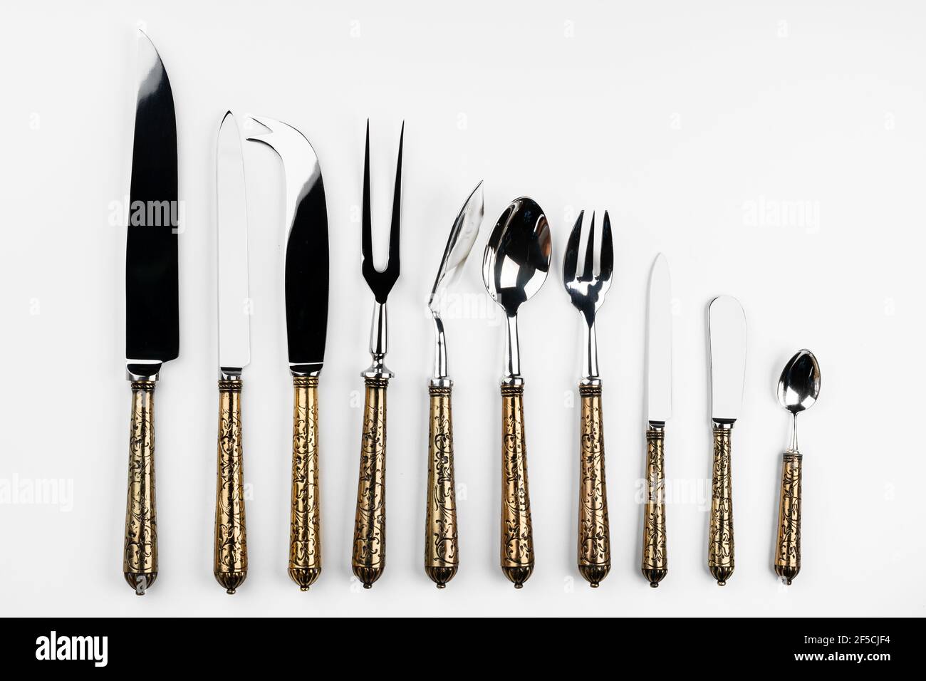 Set of stainless steel cutlery isolated on white background Stock Photo ...