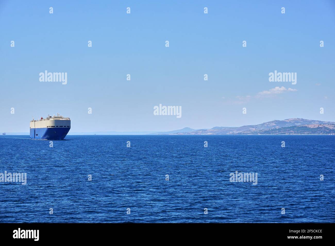 Big cargo ship crossing the strait Stock Photo - Alamy