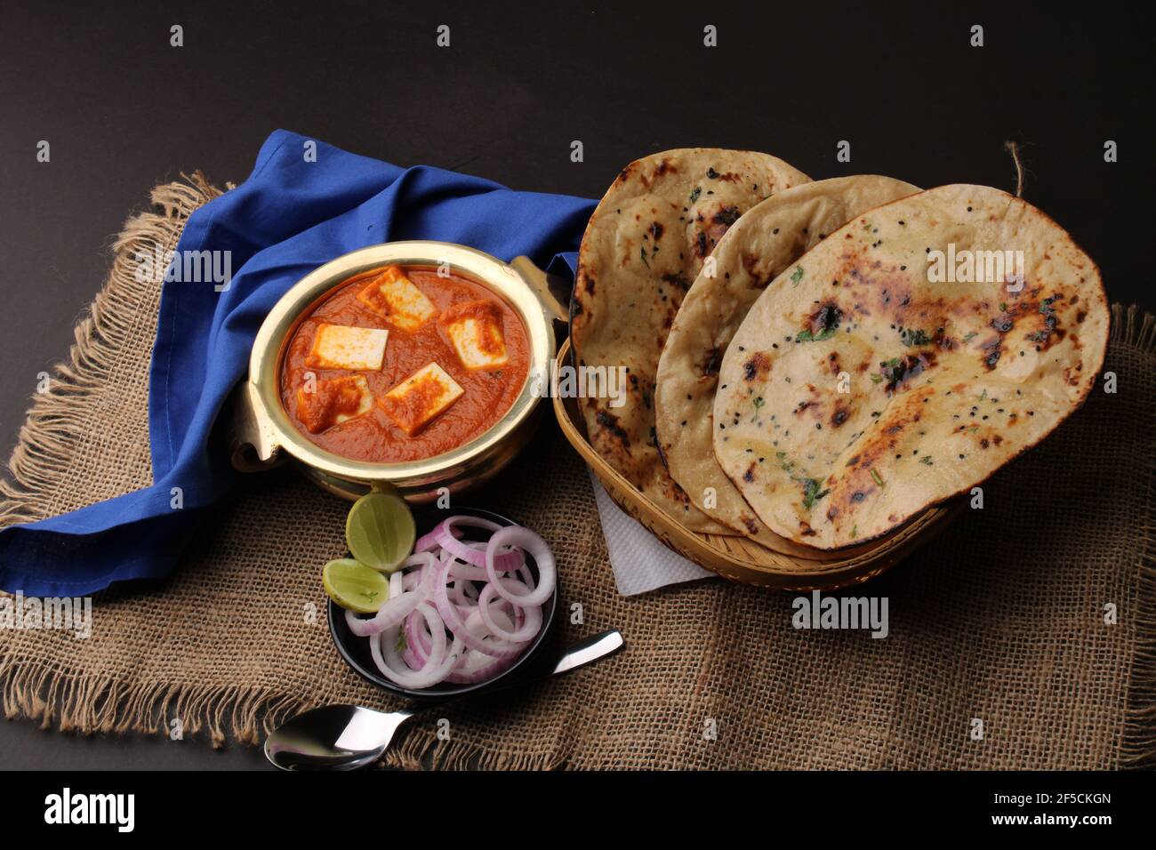 Paneer Butter Masala or Cheese Cottage Curry in serving a bowl or pan ...