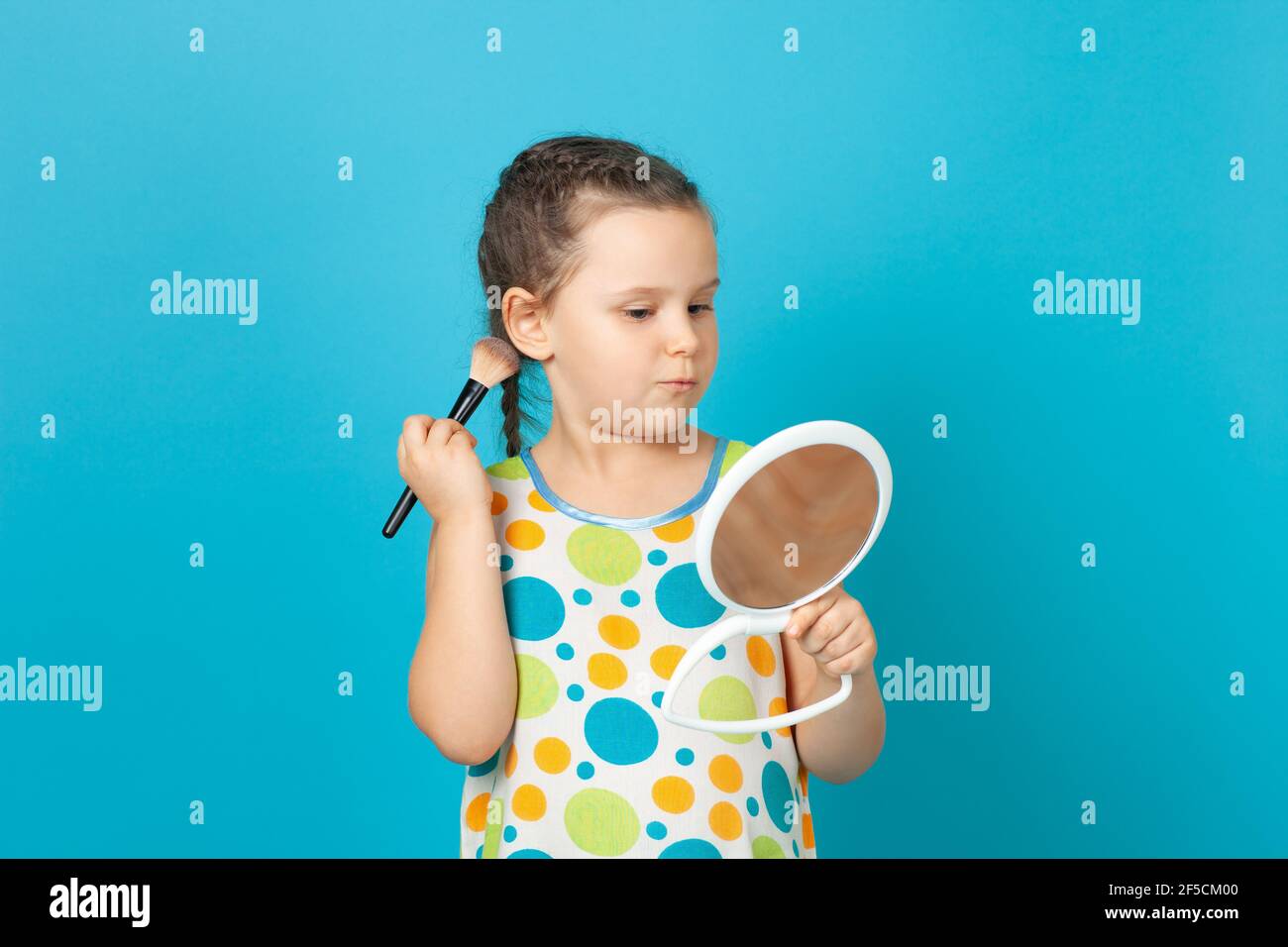 Girl showing off dress hi-res stock photography and images - Alamy