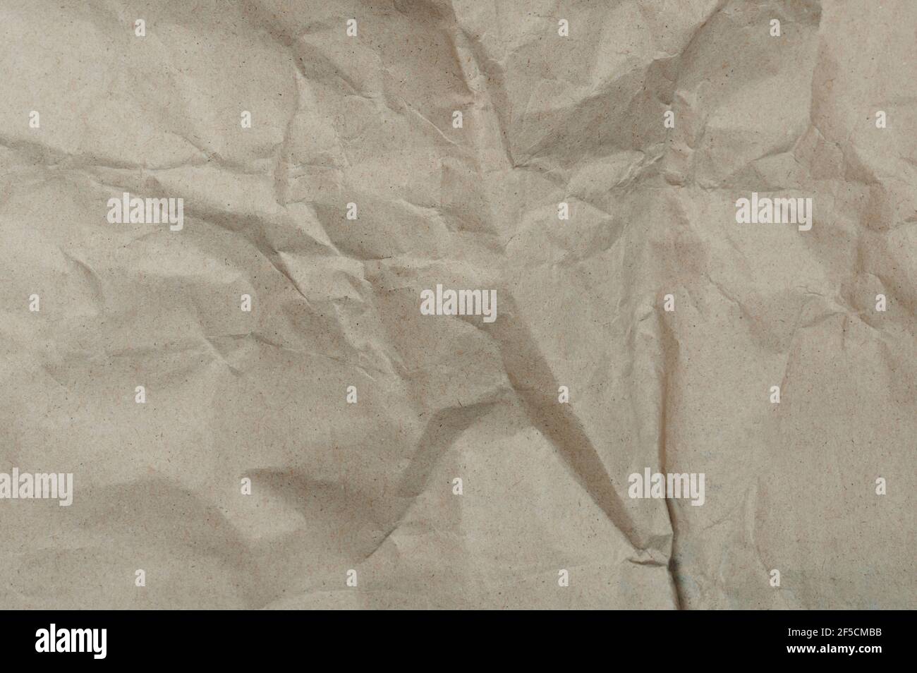 Brown crumpled paper background with abstract crease Stock Photo - Alamy