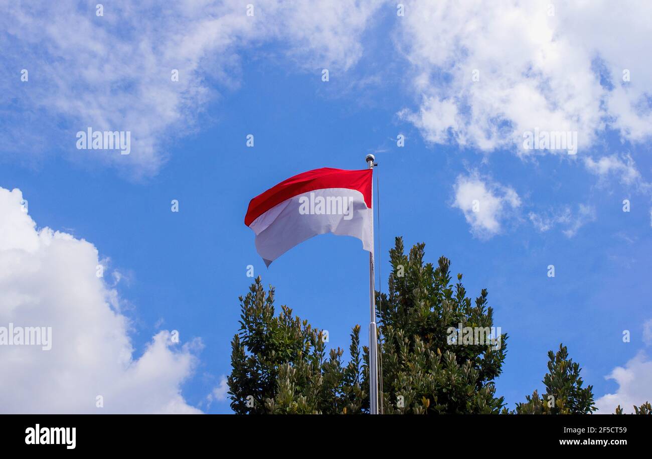 Indonesia and Monaco national flag with bluesky, white cloud and ...