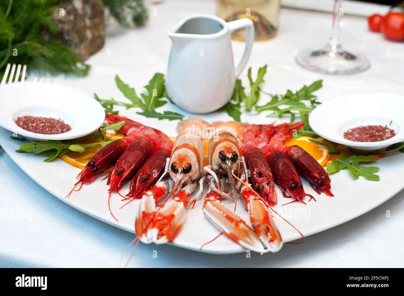 Raw scampi and shrimps mix Stock Photo - Alamy