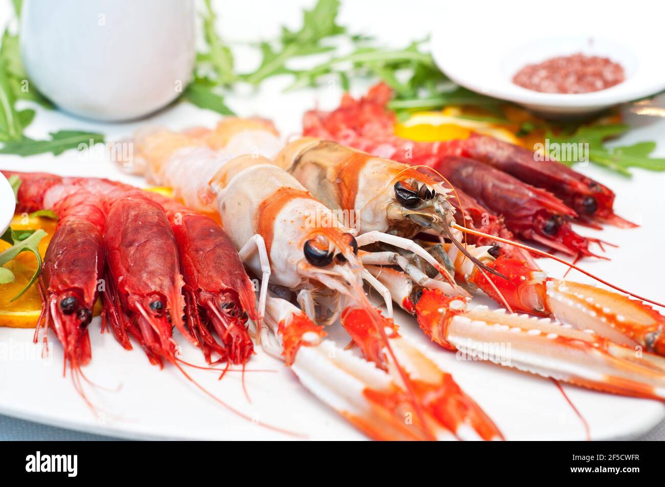 Raw scampi and shrimps mix Stock Photo - Alamy