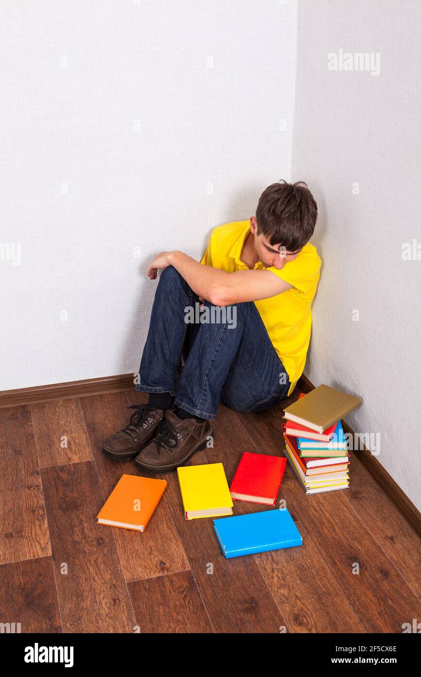 Sad boy corner room hi-res stock photography and images - Alamy