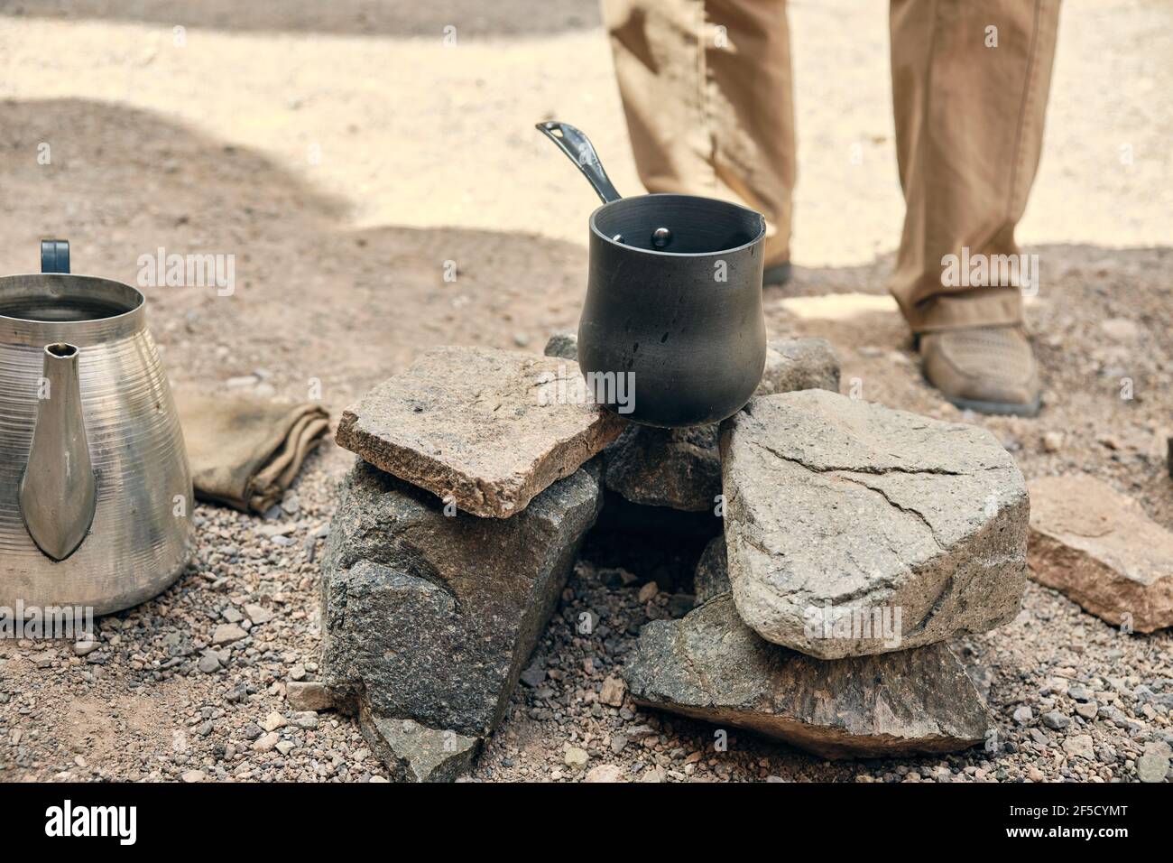 Metal Cezve With Hot Coffee On A Bonfire. Close up shot Stock Photo - Alamy