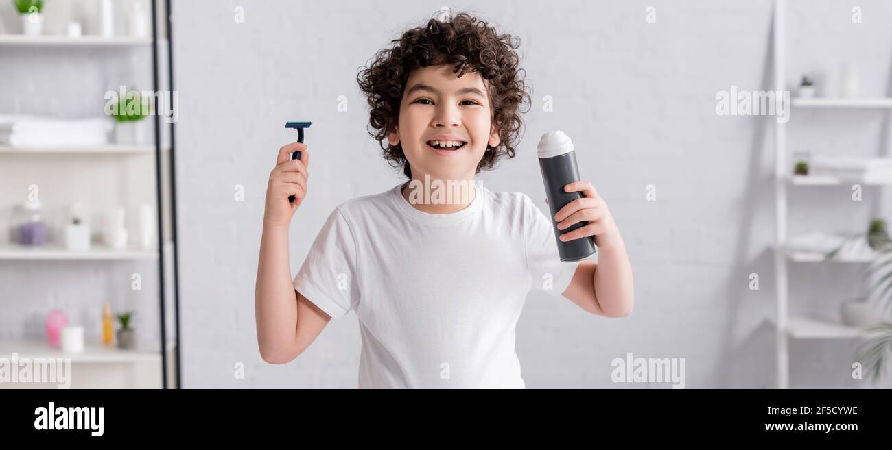 Muslim boy smiling while holding toothpaste and toothbrush, banner ...
