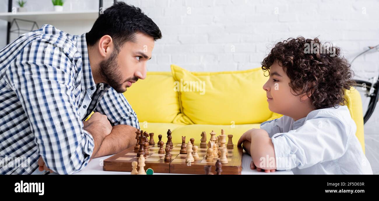 Happy father son chess hi-res stock photography and images - Alamy