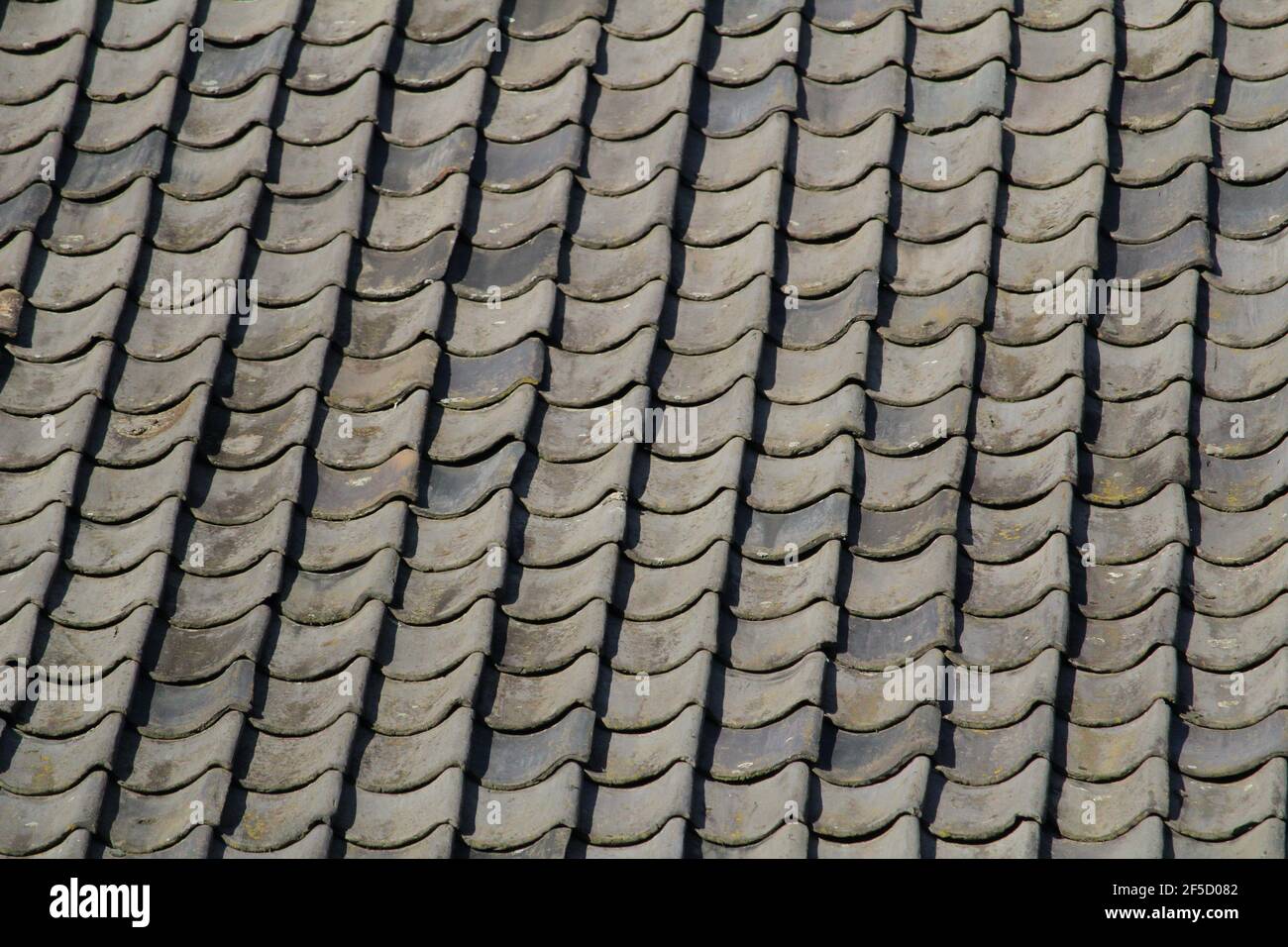 Tiles of a shingles roof, texture Stock Photo - Alamy