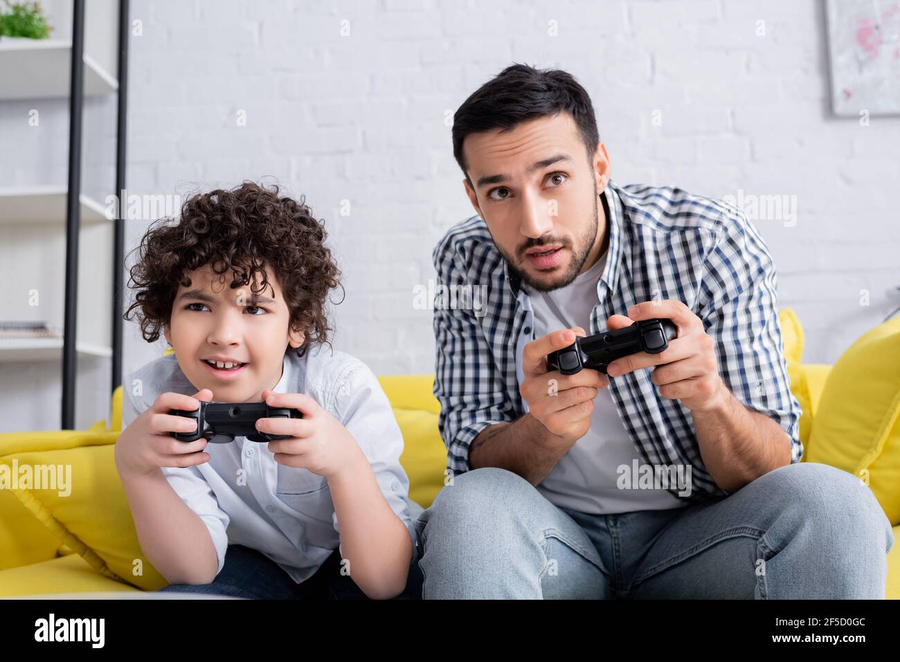 Son gaming hi-res stock photography and images - Alamy