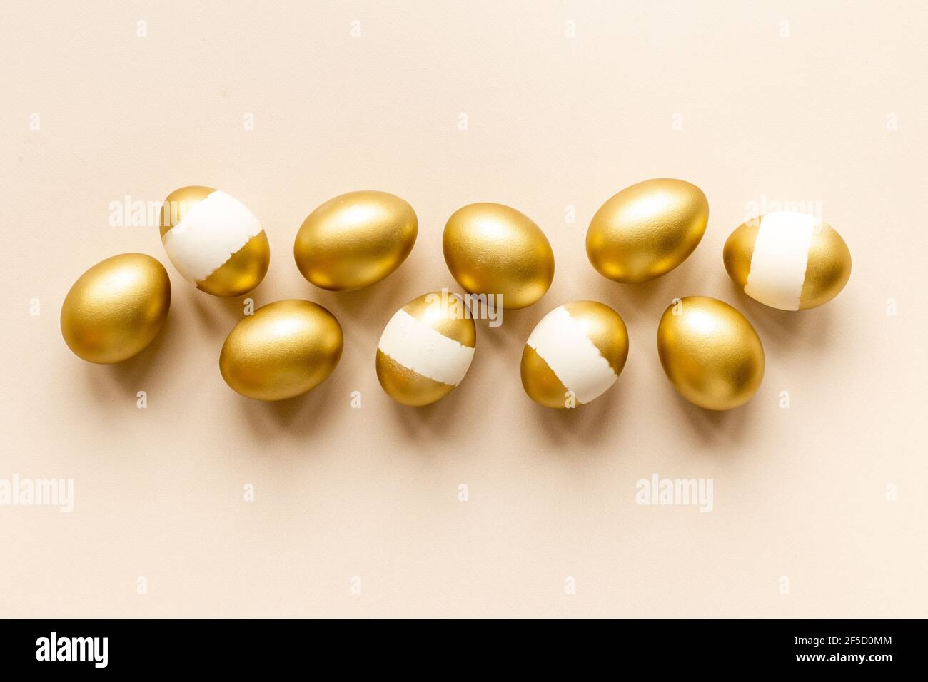 Set of golden eggs. Easter decoration. Wealth and good luck concept ...