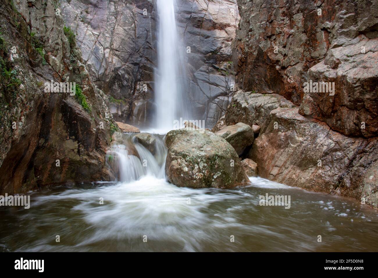 waterfall of sa spendula and water flows through the rocks, Villacidro ...