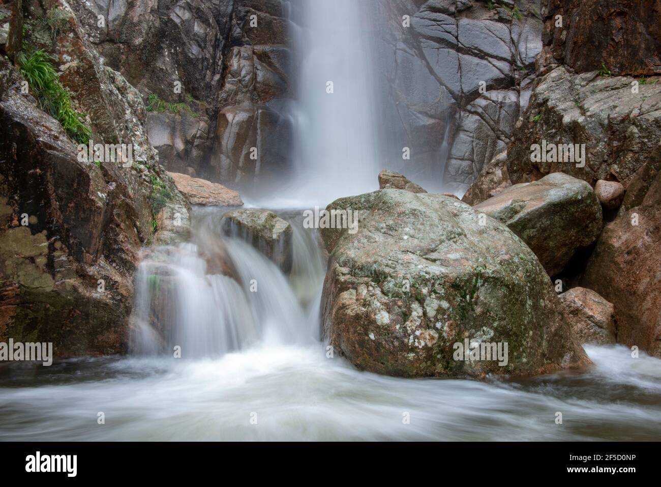 waterfall of sa spendula and water flows through the rocks, Villacidro ...