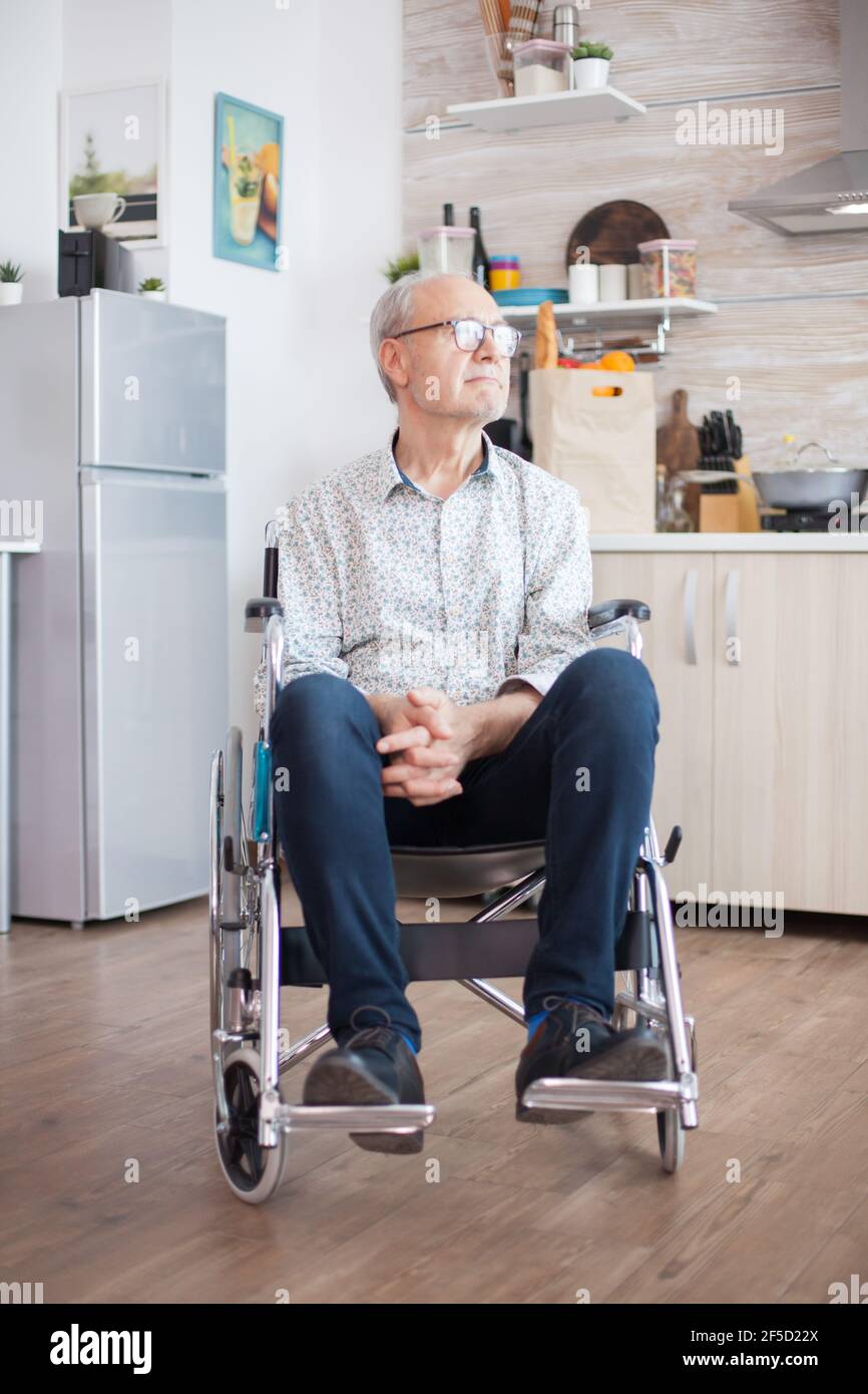 Lonely handicapped pensioner in wheelchair worrying about his life ...