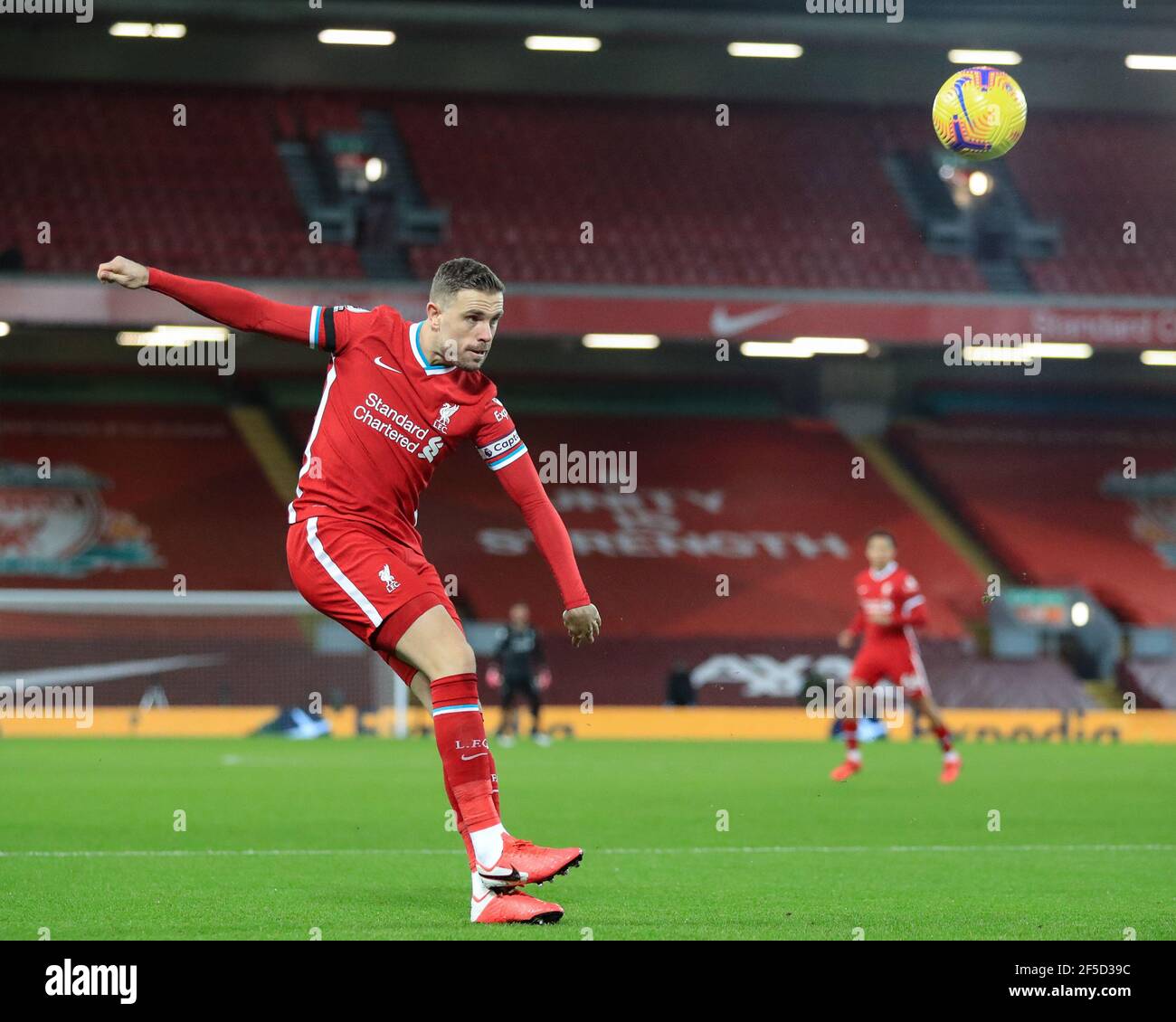 Jordan Henderson #14 of Liverpool crosses the ball into the box Stock ...