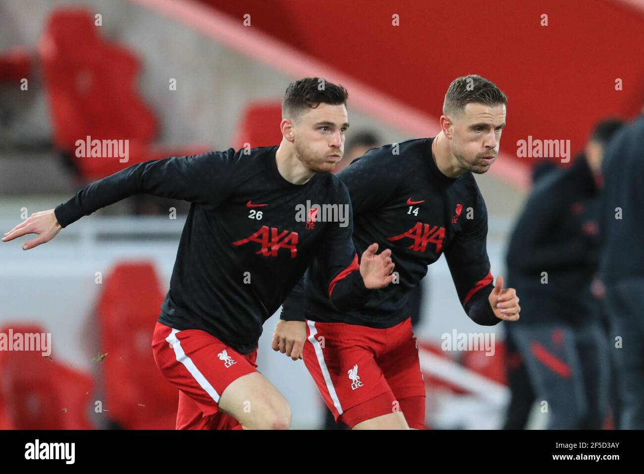 Andrew Robertson #26 of Liverpool and Jordan Henderson #14 of Liverpool ...