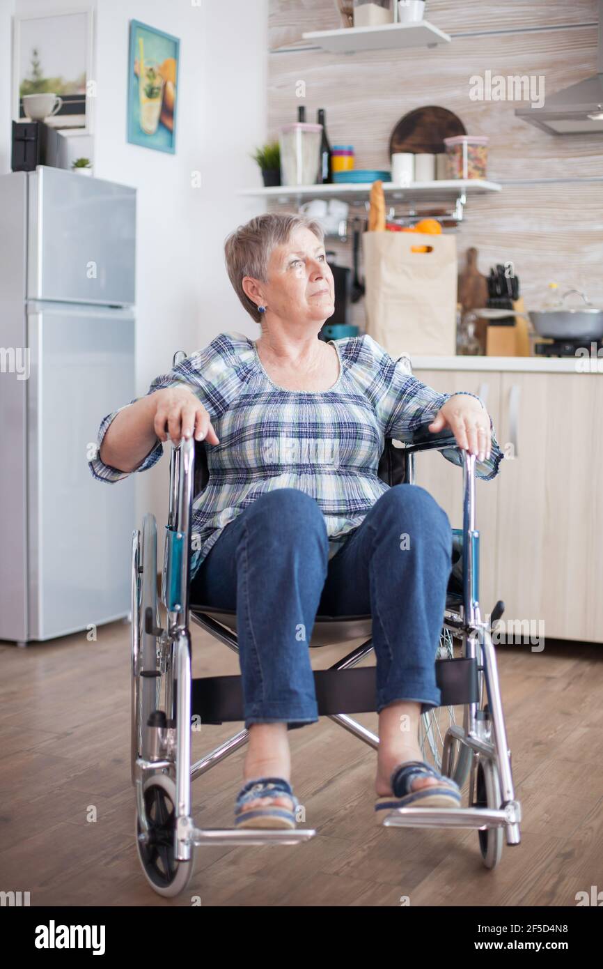 Sad old woman in wheelchair hi-res stock photography and images - Alamy