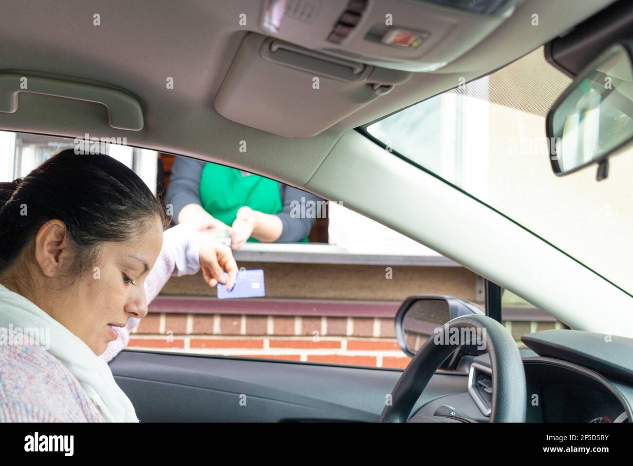 The client and the cashier hi-res stock photography and images - Alamy