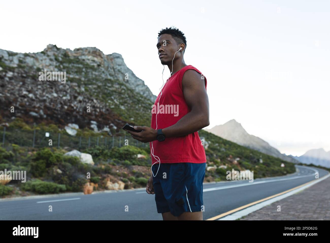 Happy man standing outdoors hi-res stock photography and images - Alamy