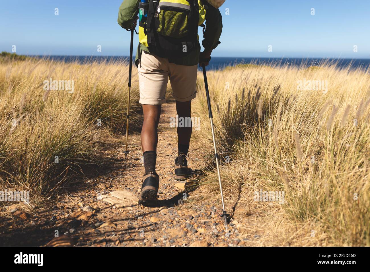 Using walking poles hi-res stock photography and images - Alamy