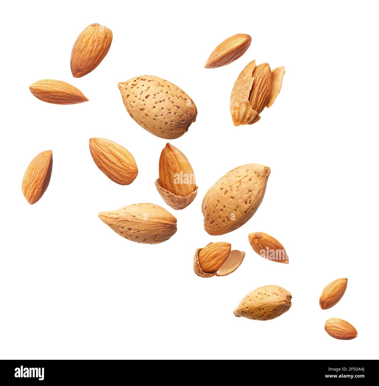Flying almonds isolated on white background Stock Photo - Alamy