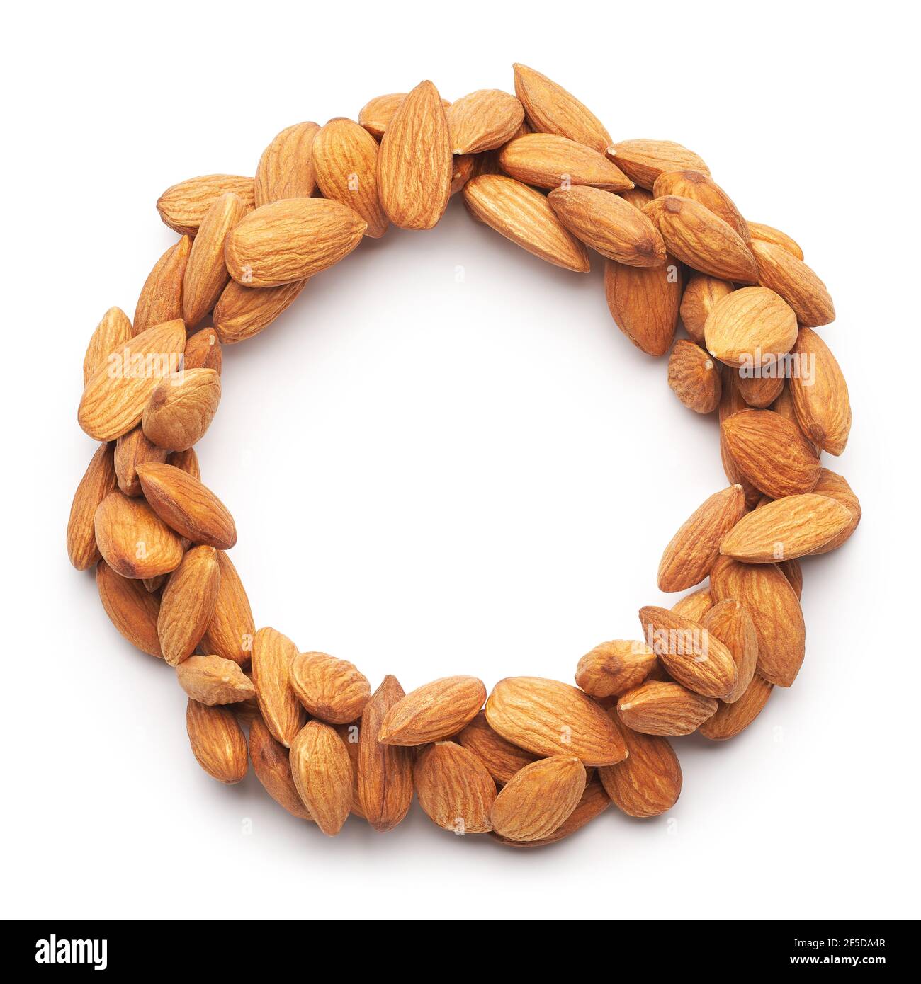 Almonds with round copyspace against white background Stock Photo - Alamy
