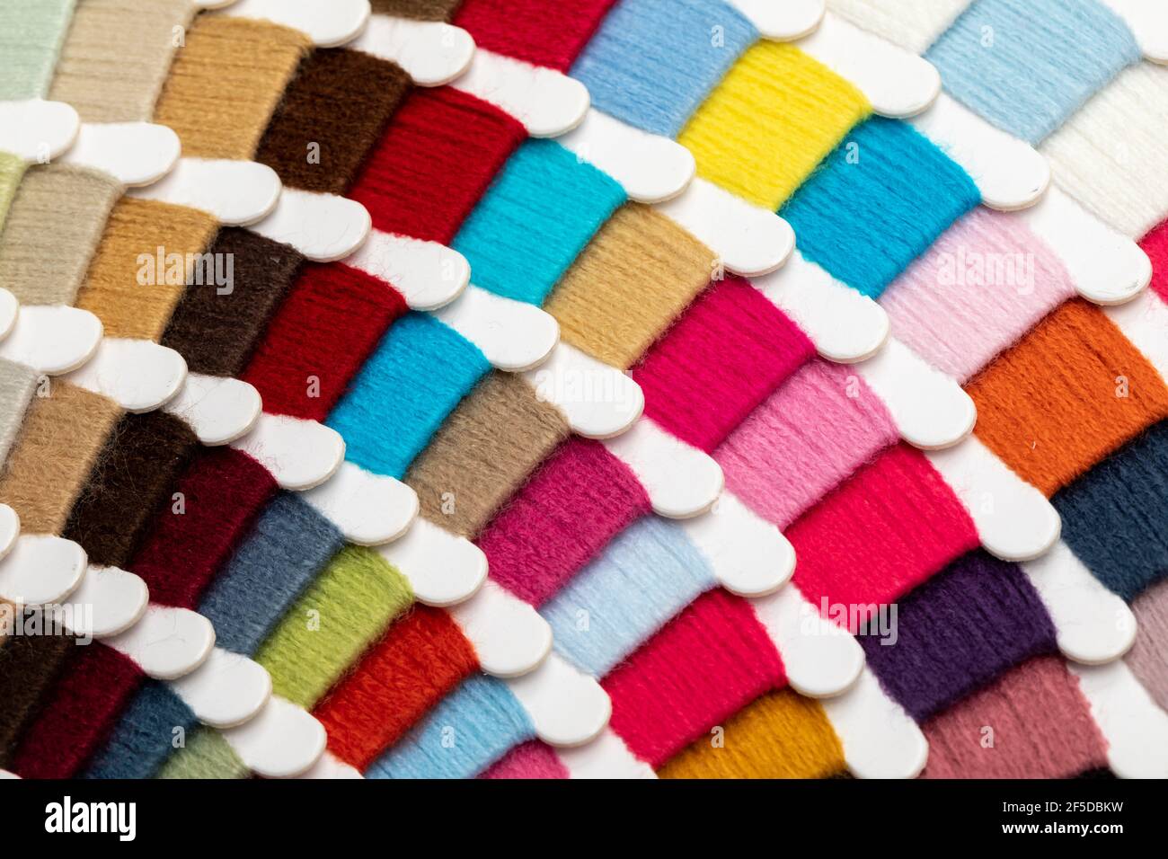 Color yarn thread sample swatches close-up Stock Photo - Alamy