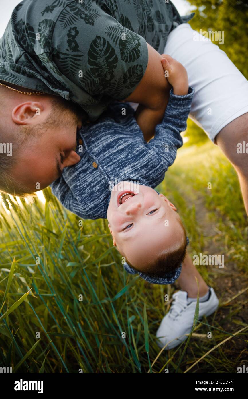 Happy childhood of a child with father Stock Photo - Alamy