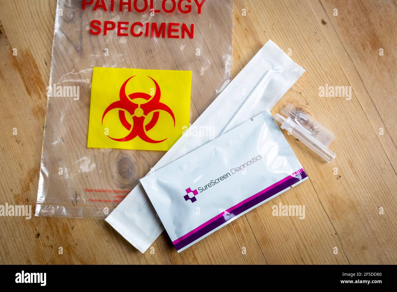 Lateral flow Covid-19 test kit and its components Stock Photo - Alamy