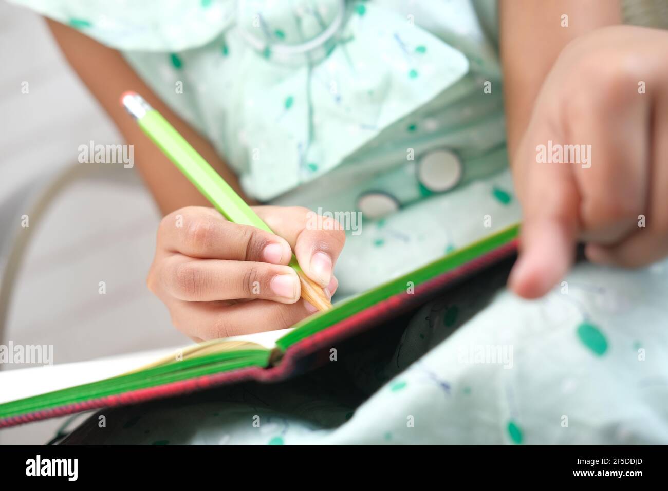 Kid writing diary hi-res stock photography and images - Alamy