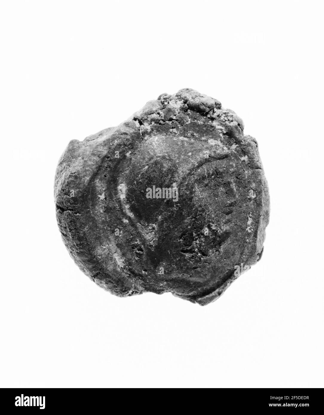 Dark brown clay seal. Unknown Stock Photo - Alamy