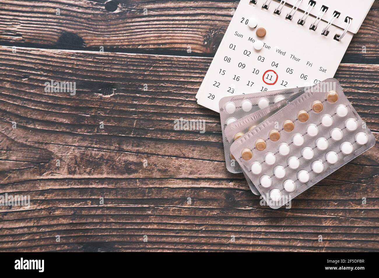 Birth control pills calendar red hi-res stock photography and images ...
