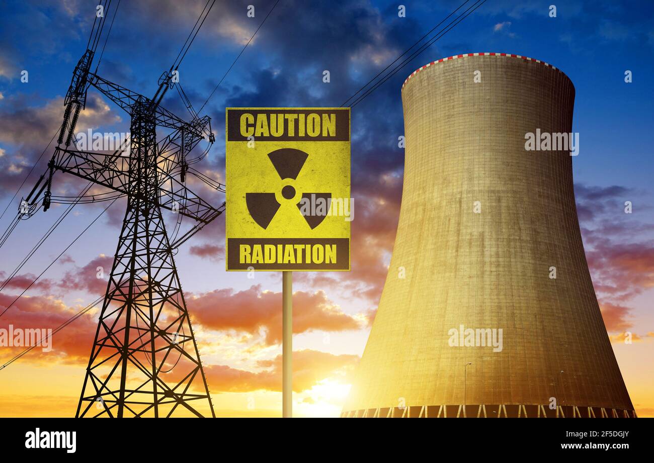 Nuclear power plant with radioactivity warning symbol and electricity ...