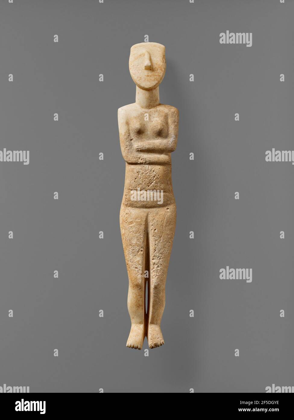Female Figure of the Early Spedos Type. Unknown Stock Photo - Alamy