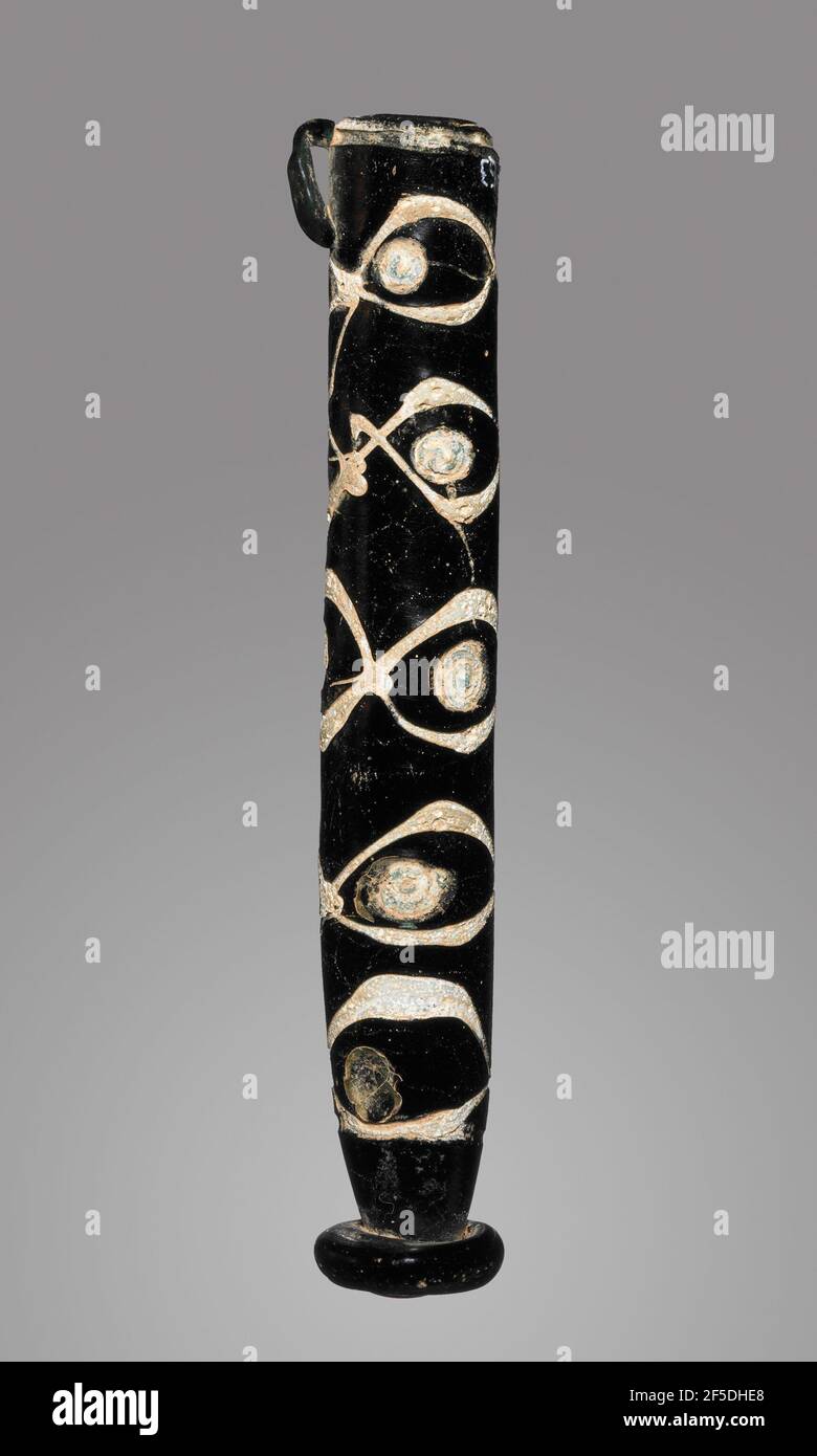 Opaque Black Flask with white trails and blobs. Unknown Stock Photo - Alamy