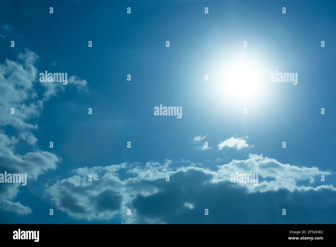 On blue cloudy hi-res stock photography and images - Alamy